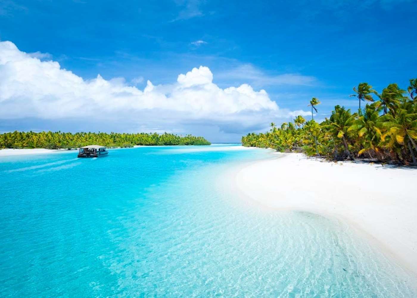 Visit Aitutaki on a trip to The Cook Islands | Audley Travel US
